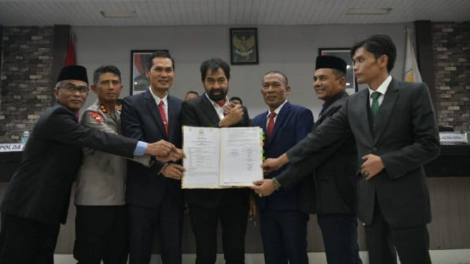Sistem Kebijakan Adat dalam Qanun Aceh