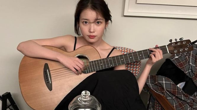 6 Rekomendasi Lagu Galau IU Bikin Hati Tersentuh